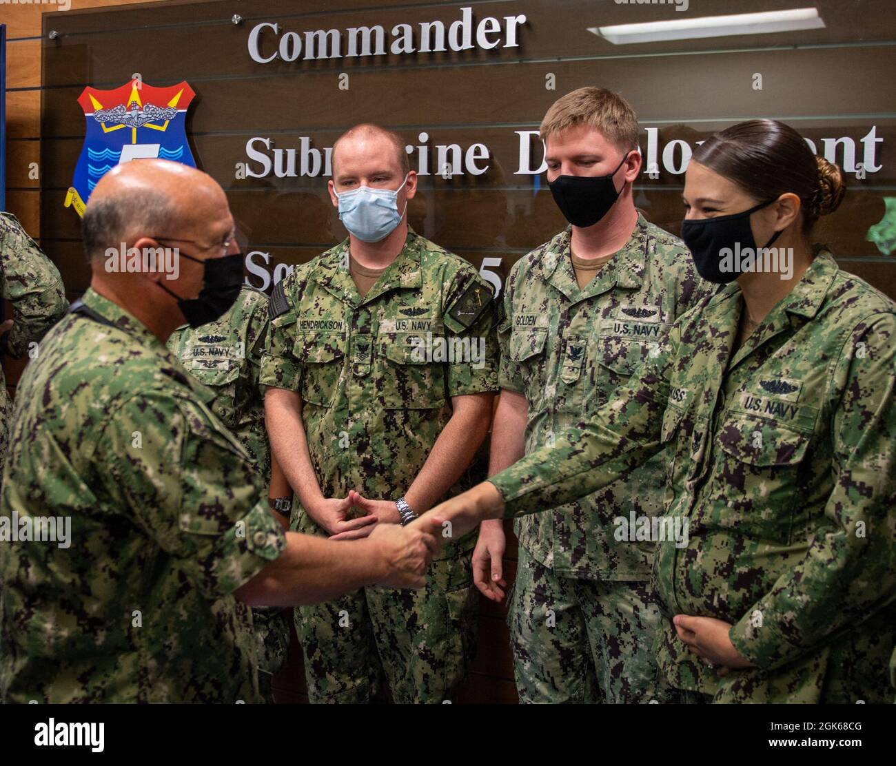 Chief of Naval Operations Adm. Mike Gilday greets Logistics Specialist (Submarine) 1st Class ...