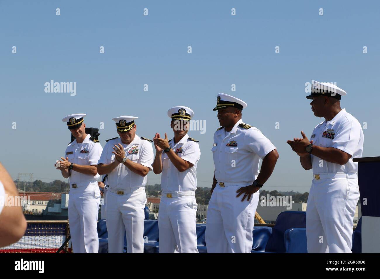 NAVAL BASE SAN DIEGO (Aug. 13, 2021) – Cmdr. Eric Winn right center, is ...
