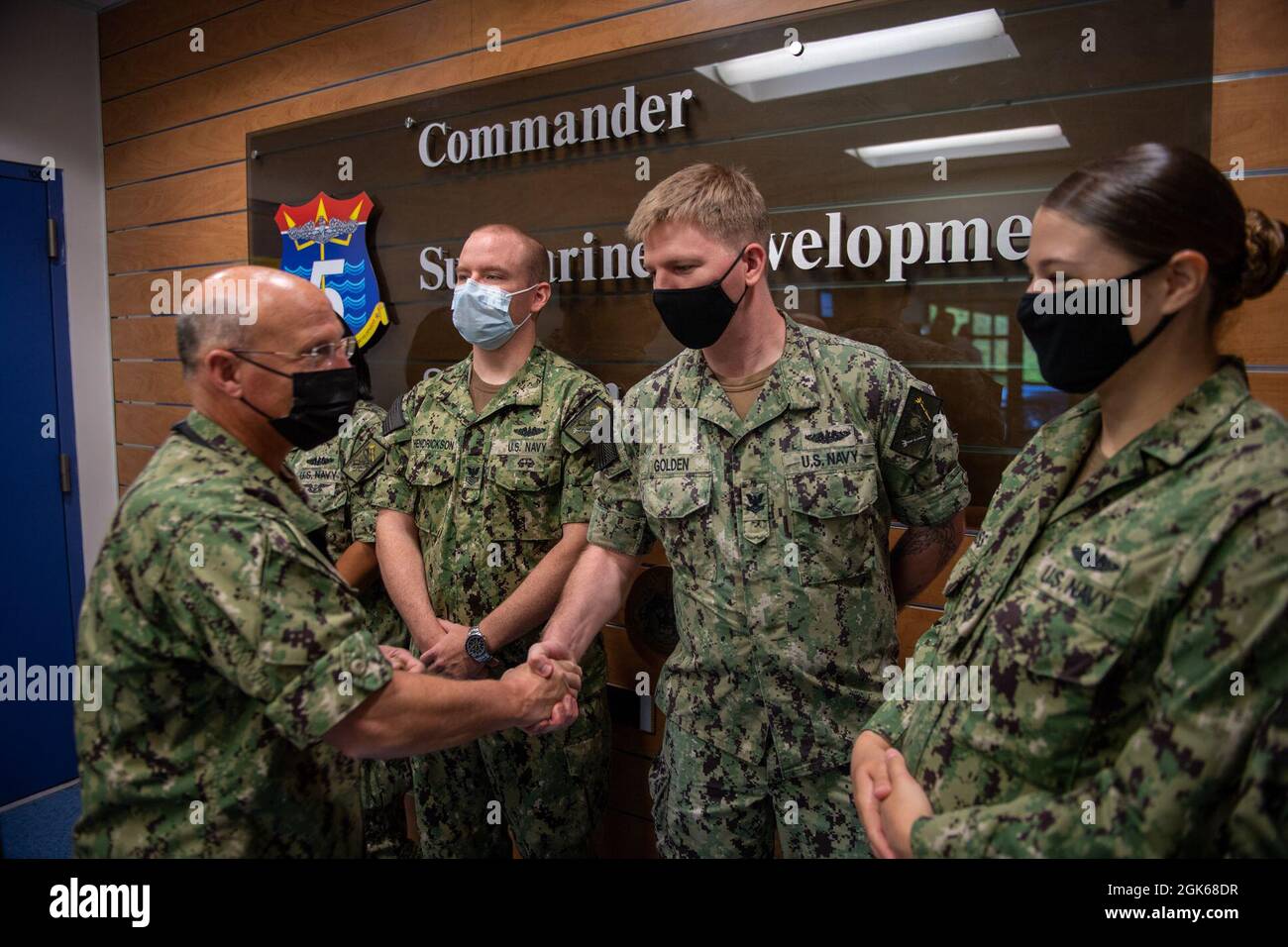 Chief of Naval Operations Adm. Mike Gilday greets Logistics Specialist (Submarine) 2nd Class ...
