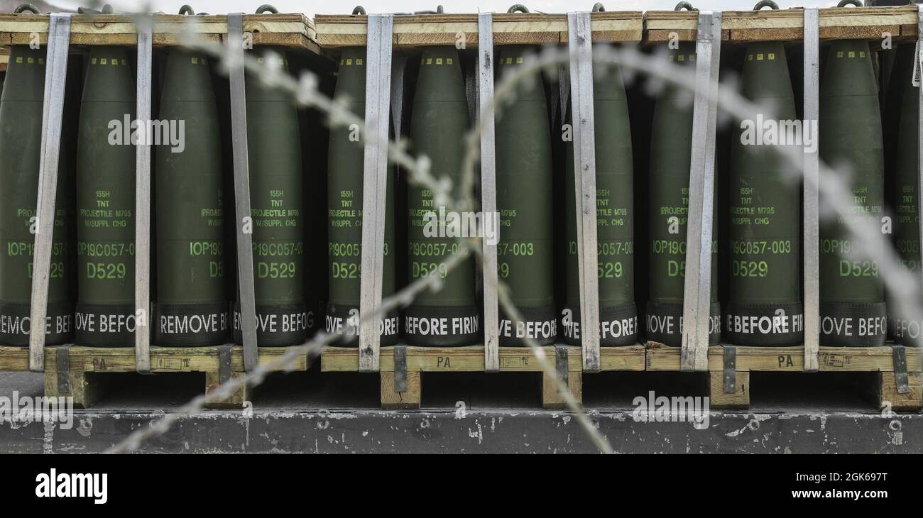 An ammunition supply point holding M795 155mm Howitzer High Explosive ...