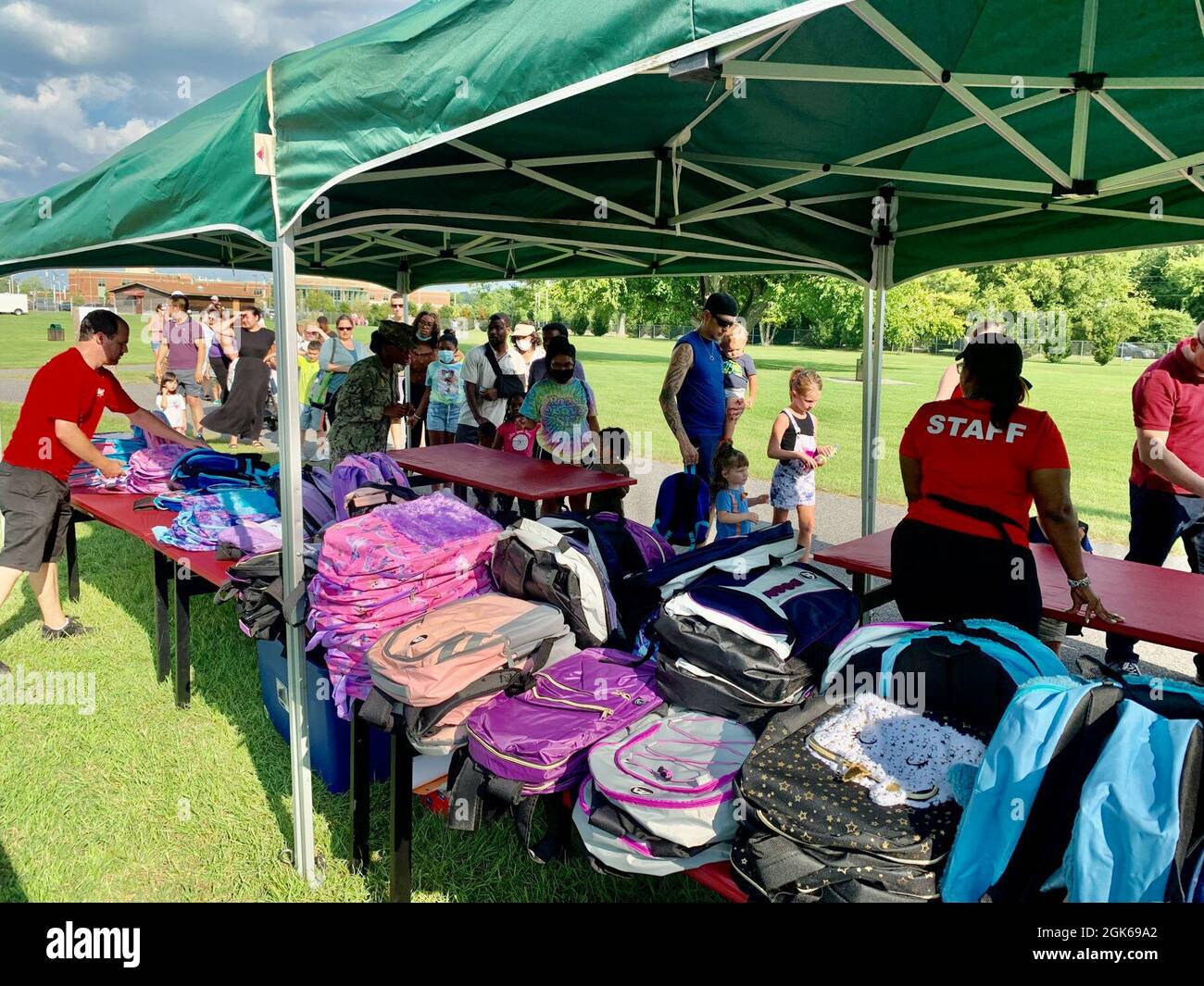 Military families line up ready to receive free school supplies and ...