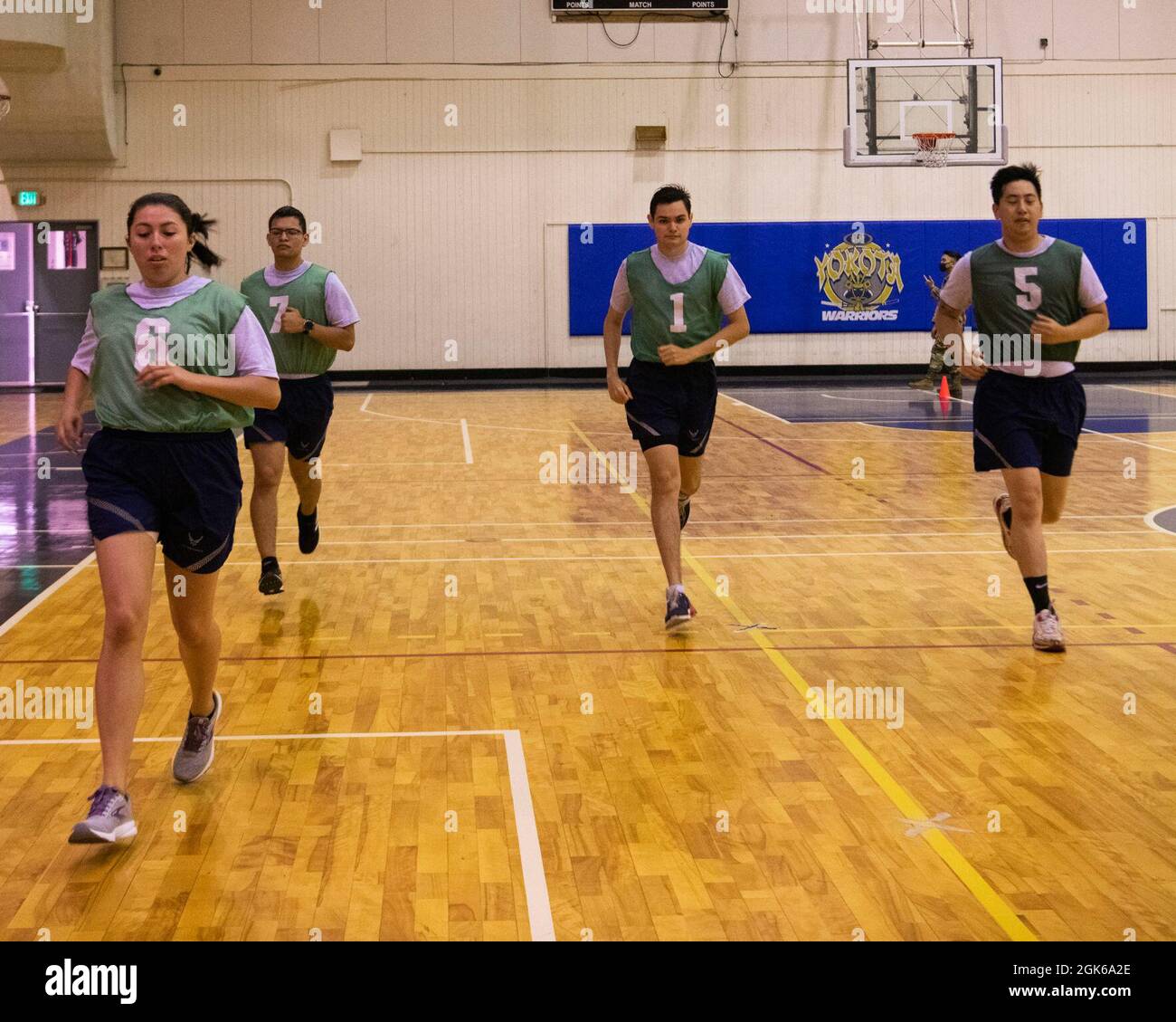 Members of the 374th Contracting Squadron perform High Aerobic Multi ...