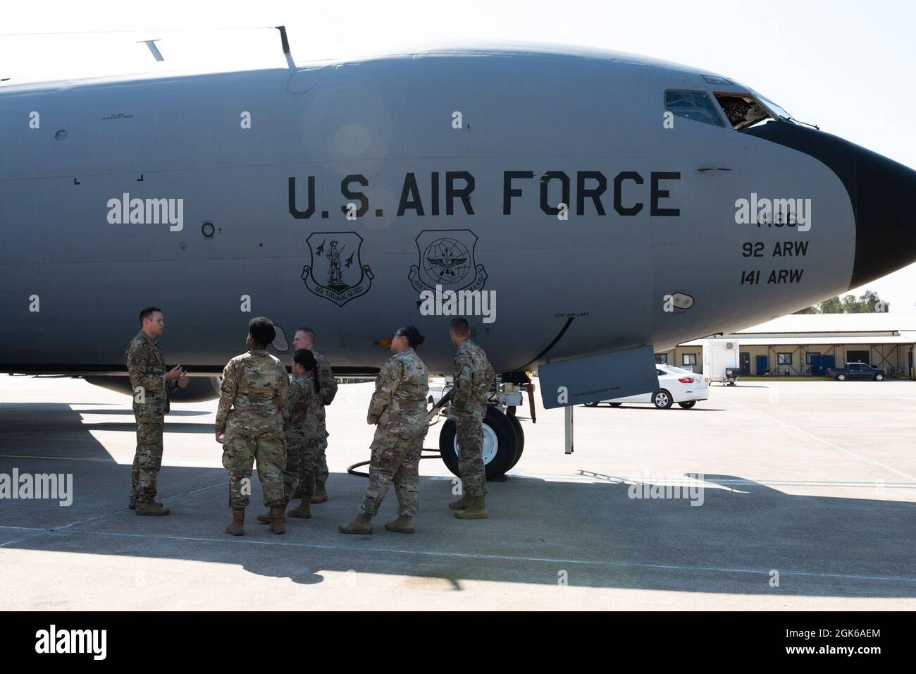 Maj. Miles McDowell (left), an instructor pilot assigned to the 93rd Expeditionary Air Refueling ...