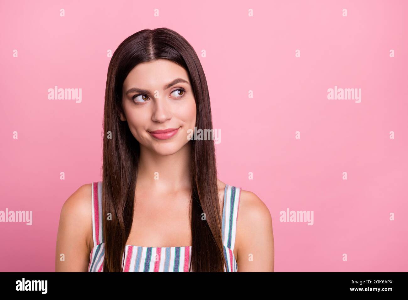 Portrait of attractive bewildered girl guessing copy empty space ...