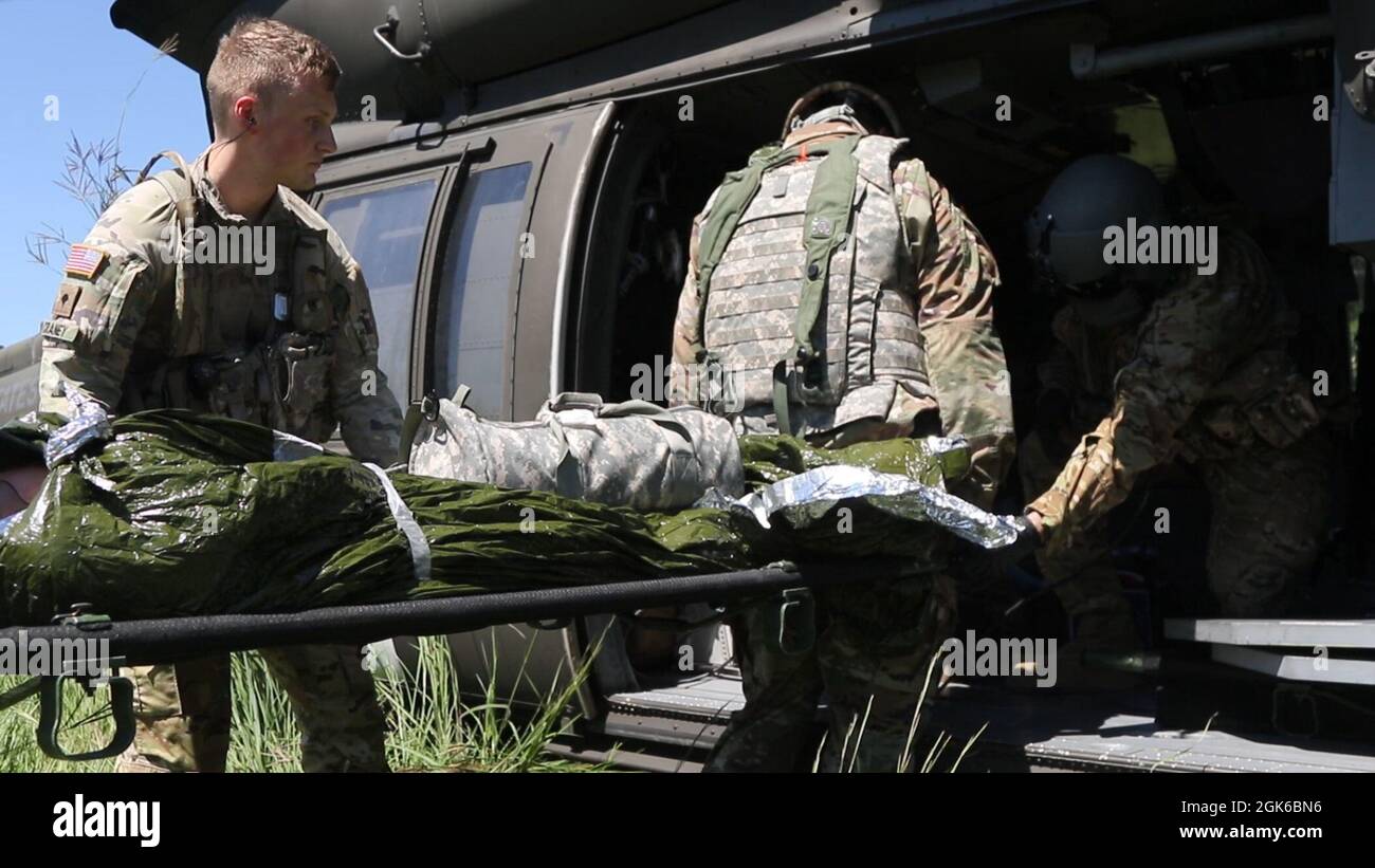 U.S. Army Reserve medics load a Tactical Combat Casualty Care ...