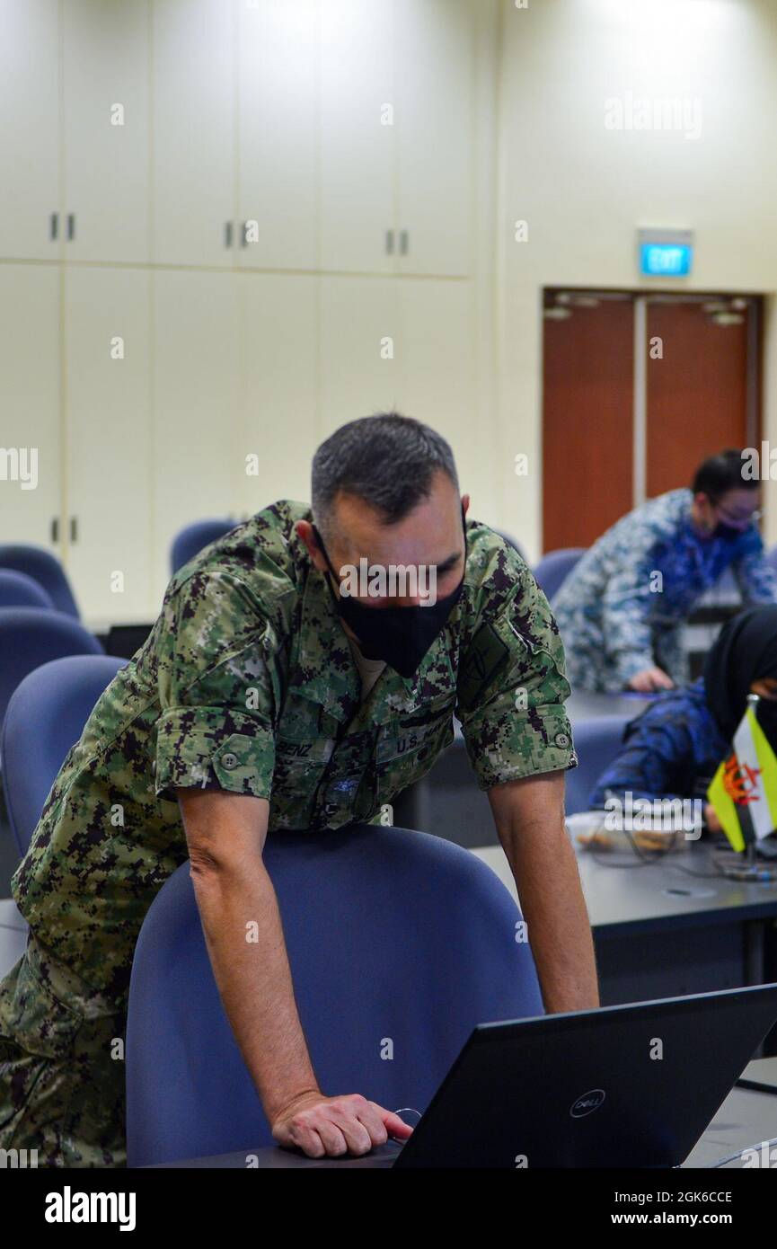 210814-N-HG389-0002 SINGAPORE (Aug. 14, 2021) – U.S Navy Capt. Tim ...