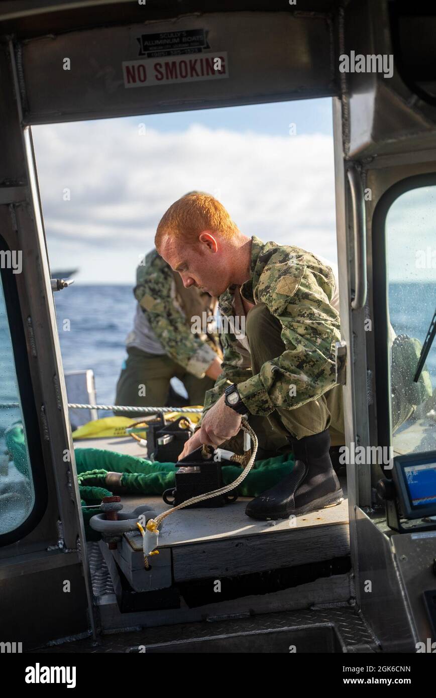 Navy Diver 3rd Class Aiden Lockard, assigned to Mobile Diving Salvage ...