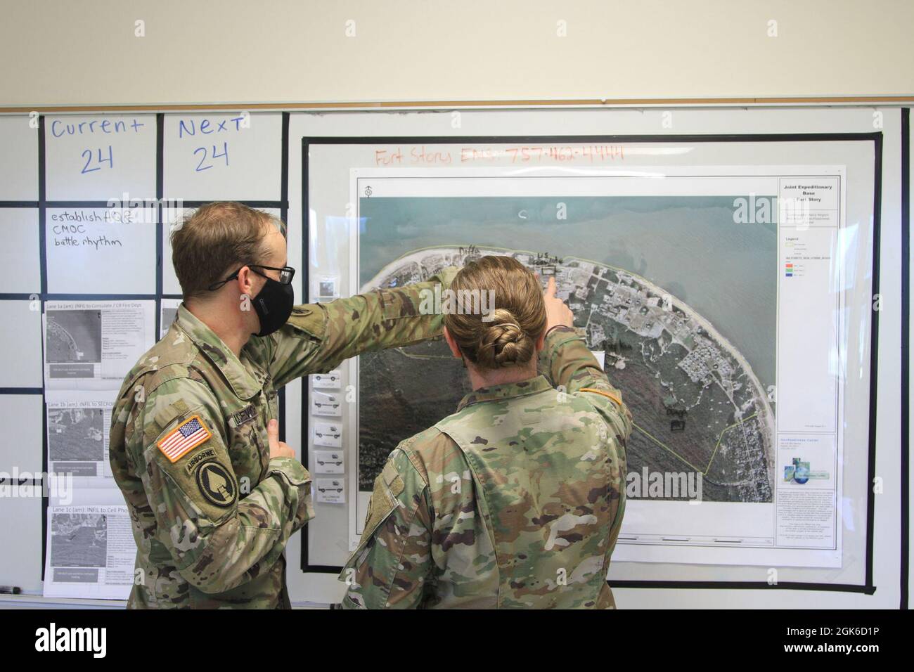 U.S. Army Reserve Capt. John Milicevich, a civil affairs officer, and ...