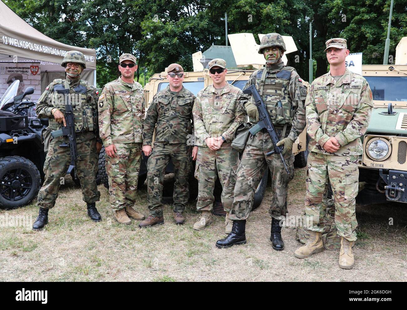 U.S. Army Staff Sgt. Ryan Stull (from left), 1st Lt. Ethan Stankiewicz ...