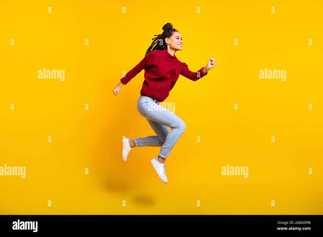 Full length high of charming pretty dark skin woman dressed red sweater ...