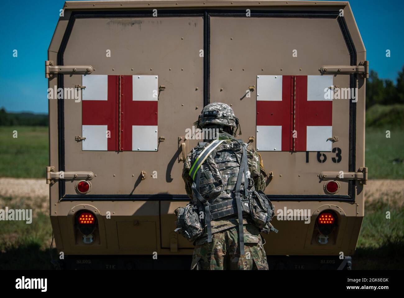 U. S. Army medic loads patients into a medical vehicle during a ...