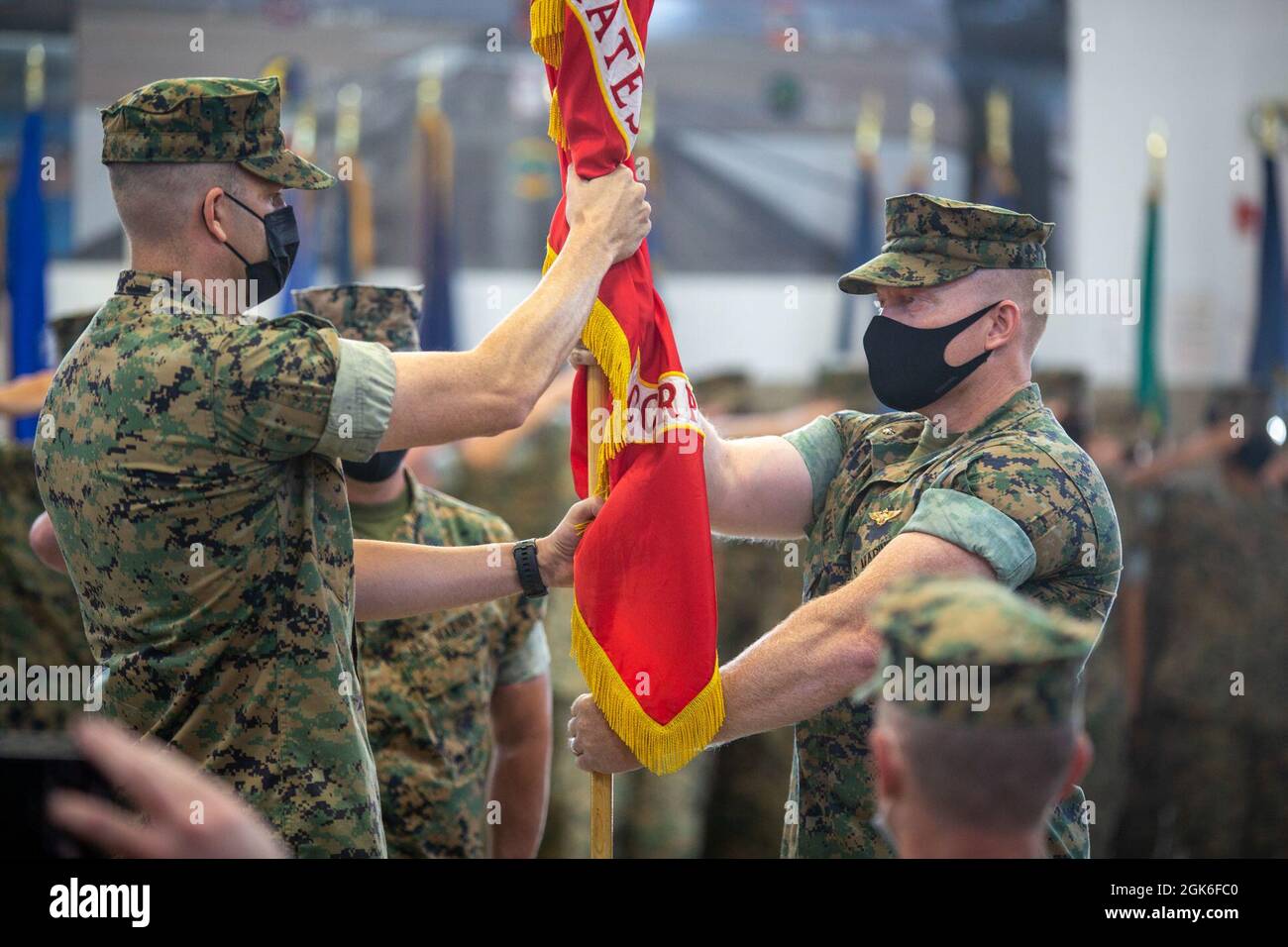 U.S. Marine Corps Lt. Col. Jason M. Ellis, left, the incoming ...