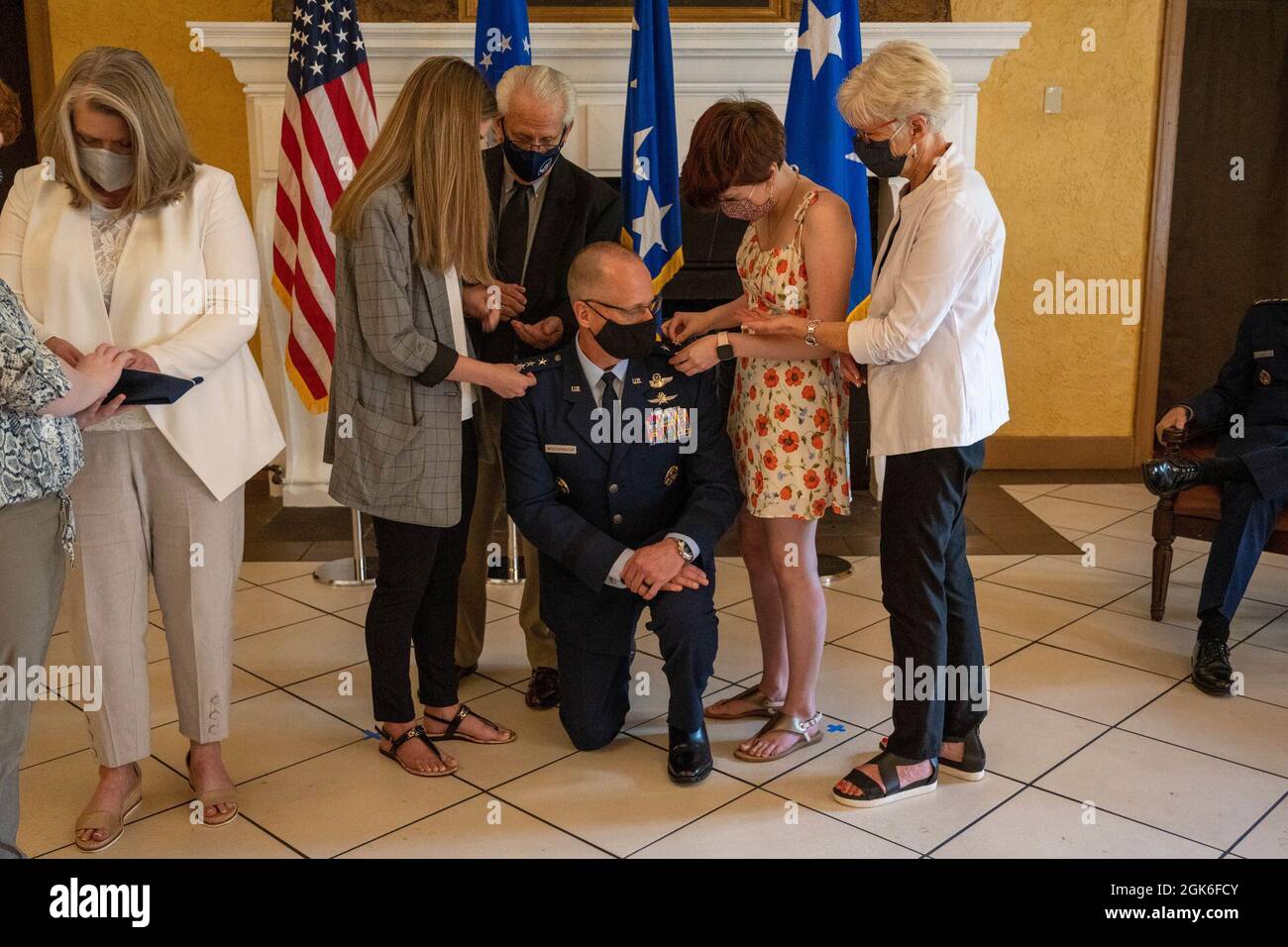 Lt. Gen. Mark E. Weatherington has his new rank pinned on by his family ...