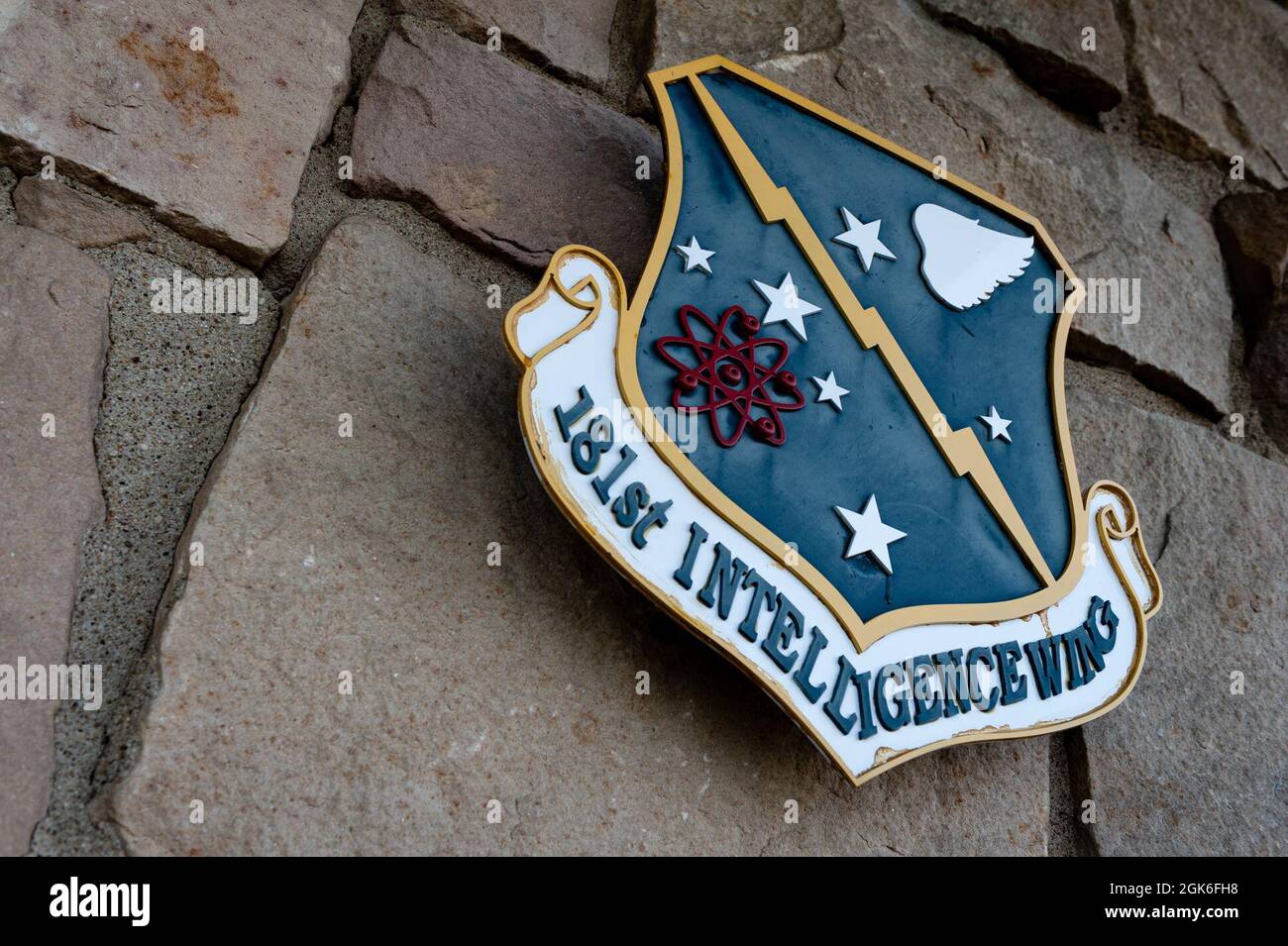 The 181st Intelligence Wing seal is seen affixed to a building at ...