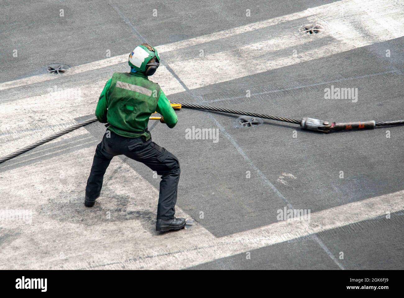 210815-N-DW158-1007 ARABIAN SEA (Aug. 15, 2021) – Airman Armando Guzman ...