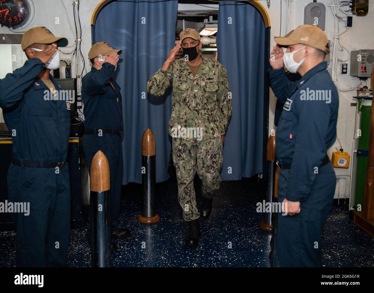 PACIFIC OCEAN (August 15, 2021) Capt. Karrey Sanders passes through ...
