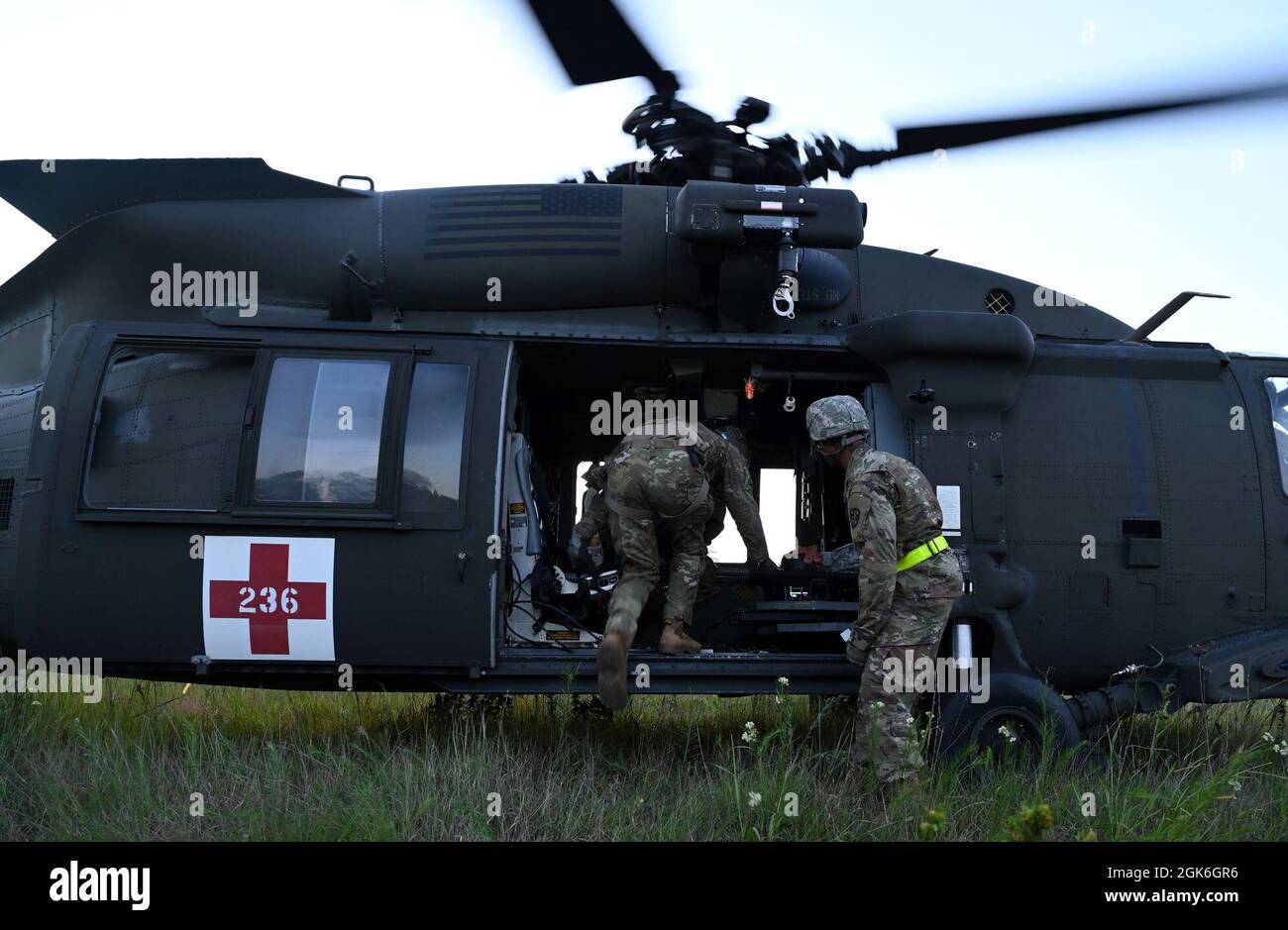 From left, U.S. Army Staff Sgt. Ethan Griffin, a flight paramedic, and ...