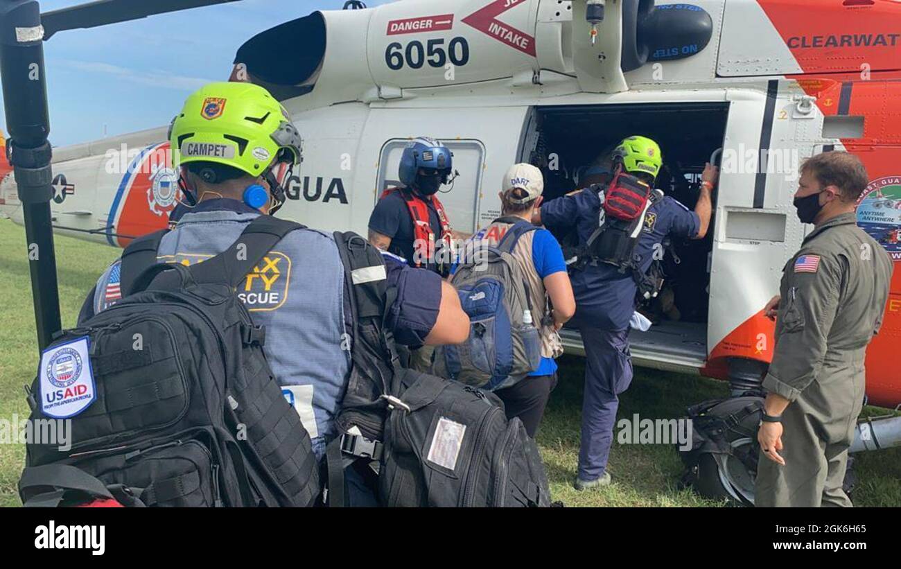 A U.S. Coast Guard Air Station Clearwater helicopter crew embarks ...