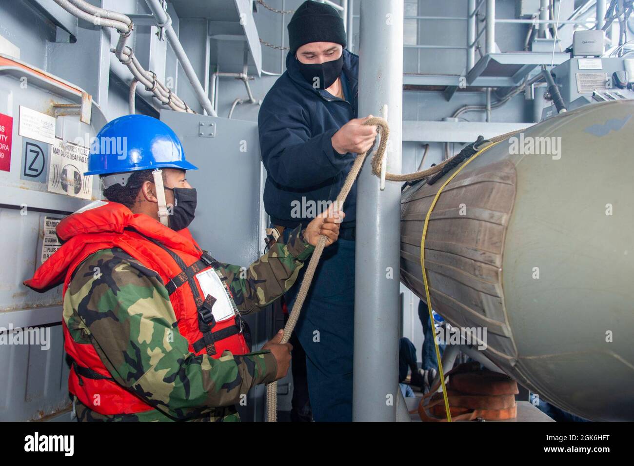PACIFIC OCEAN (August 16, 2021) Seaman Jordan Fisher (left), from ...