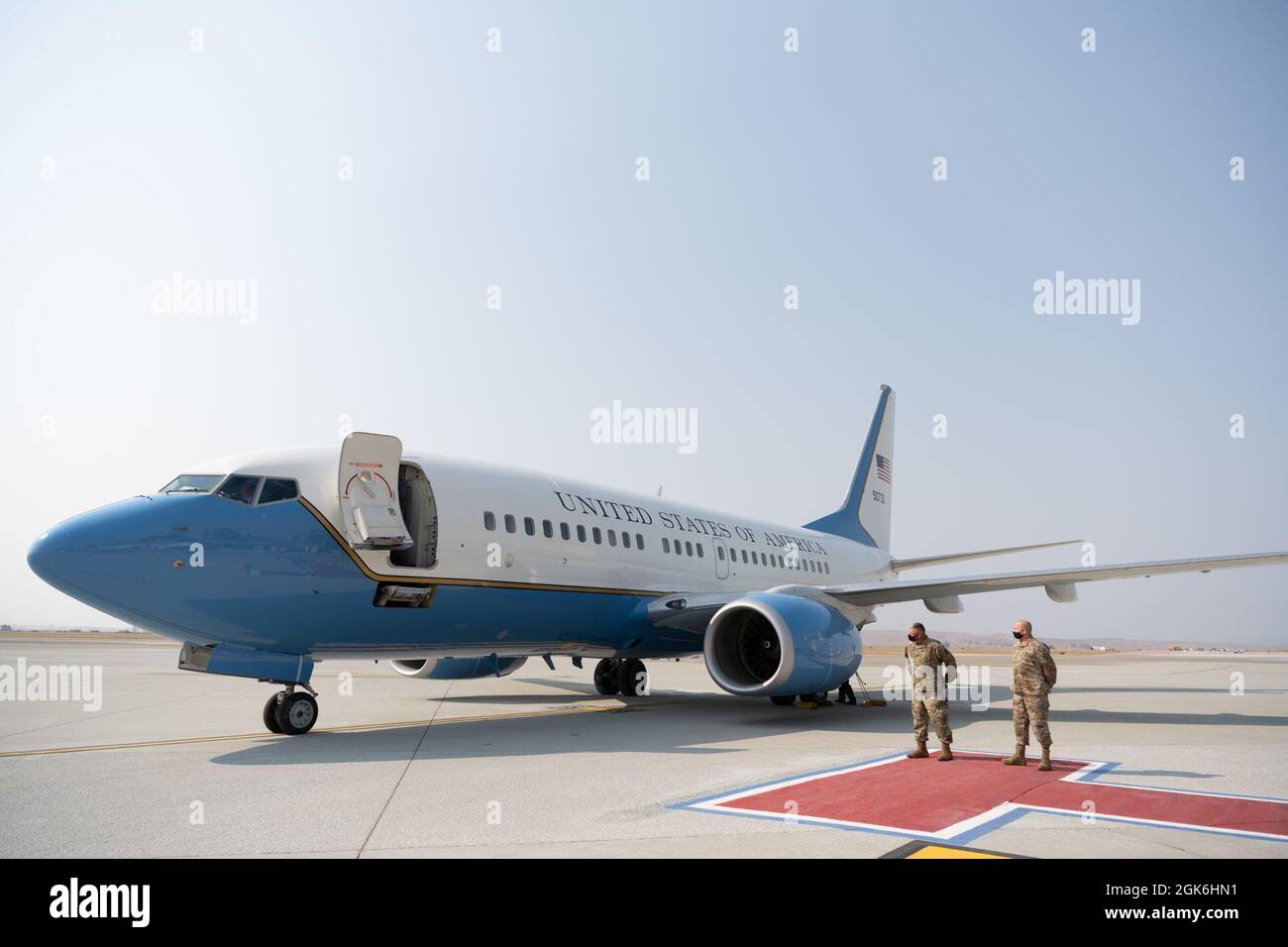 U.S. Air Force Col. Corey Simmons, left, 60th Air Mobility Commander ...