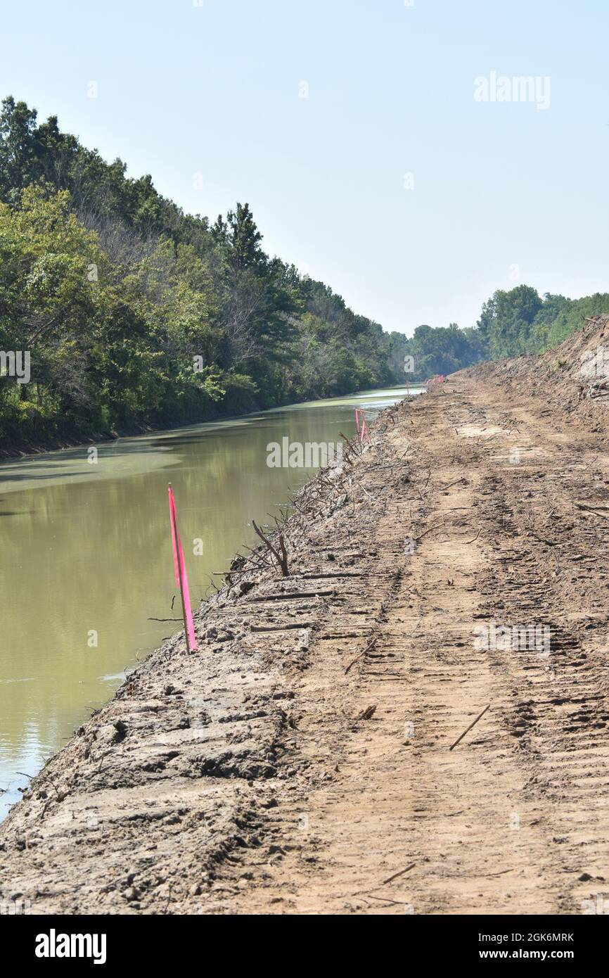 Heavy equipment operators prepared this section of the bank to ...
