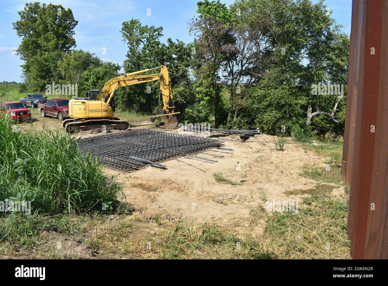 This prepositioned tied rebar and excavator are key tools for the ...