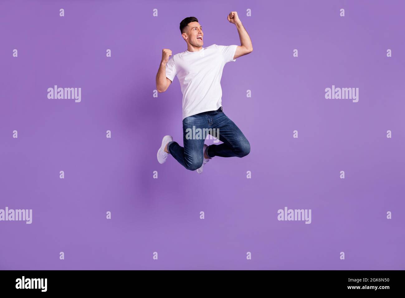 Full body photo of young man happy positive smile jump rejoice win ...