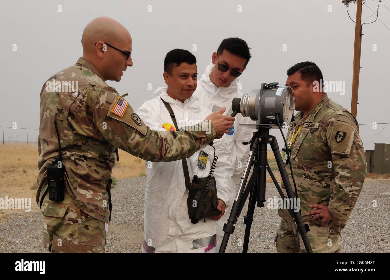 Capt. Daniel W. Arguello (first from left) and 1st Lt. Joshua D ...