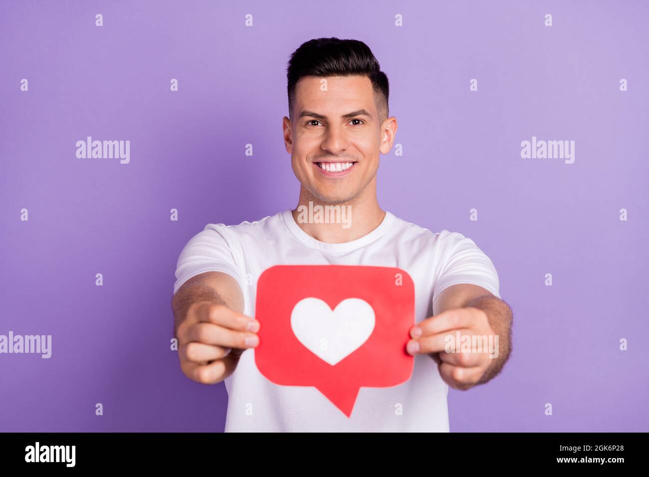 Photo of young man happy positive smile show heart like icon blogger ...