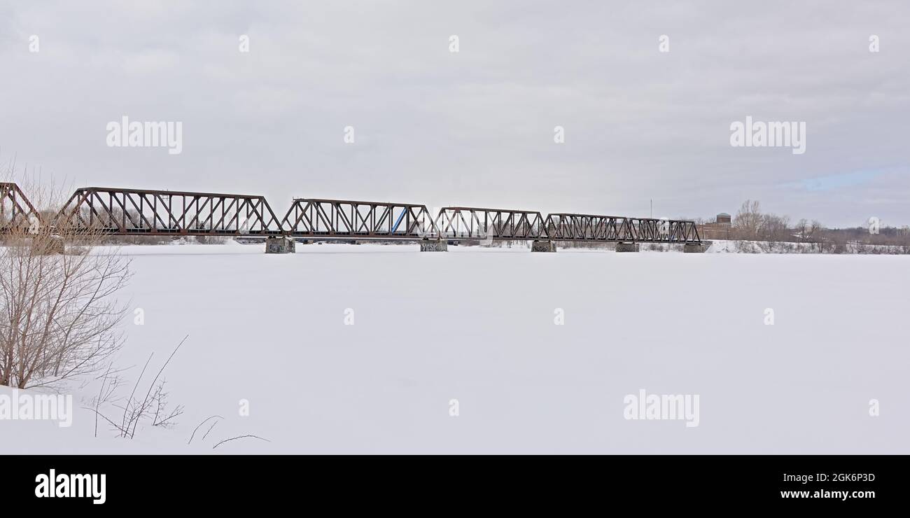 Prince of Wales rail bridge over frozen Ottawa river Stock Photo - Alamy