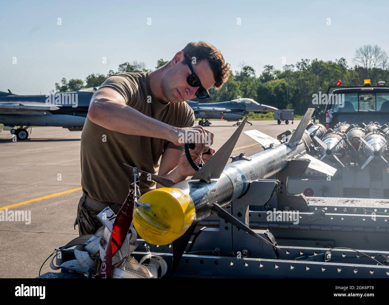 U.S. Air Force Staff Sgt. Cameron Johnson, weapons load crew cheif ...