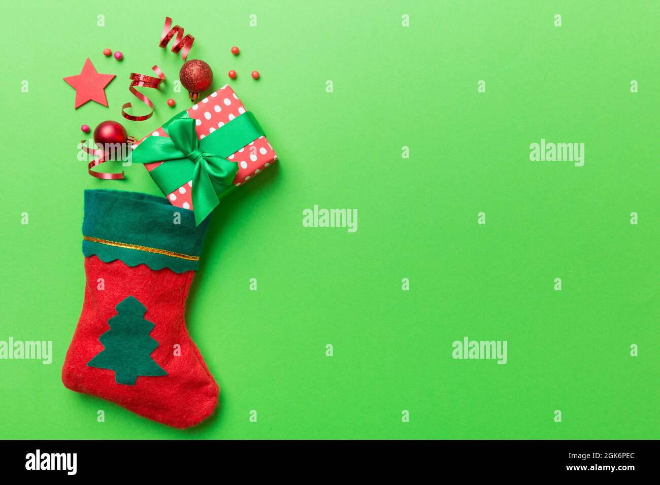 santa red sock top view on the color background with empty space ...