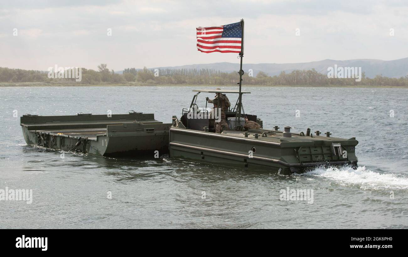 A Soldiers, with the 671st Multi-Role Bridge Company, operates a Bridge ...
