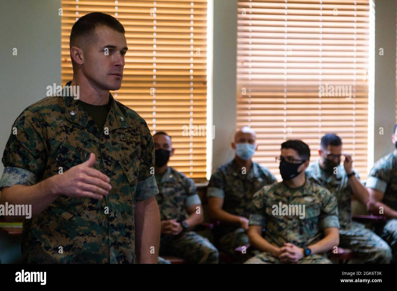Lt. Col. Russell Belt, Information Lt. Col. monitor, speaks to officers ...