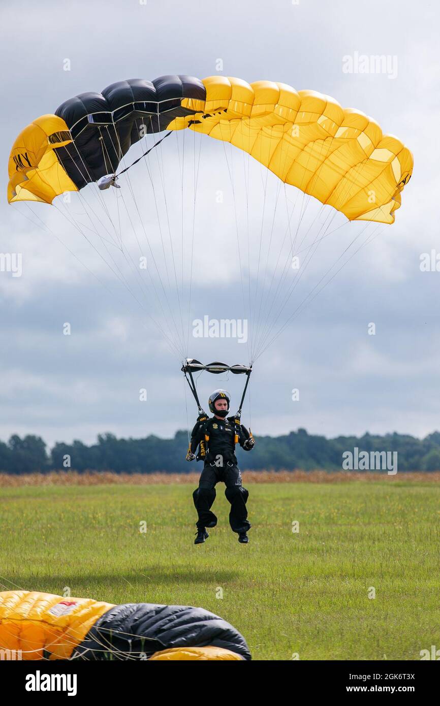 U.S. Army Staff Sgt. Mike Connors, U.S. Army Parachute Team, makes a ...