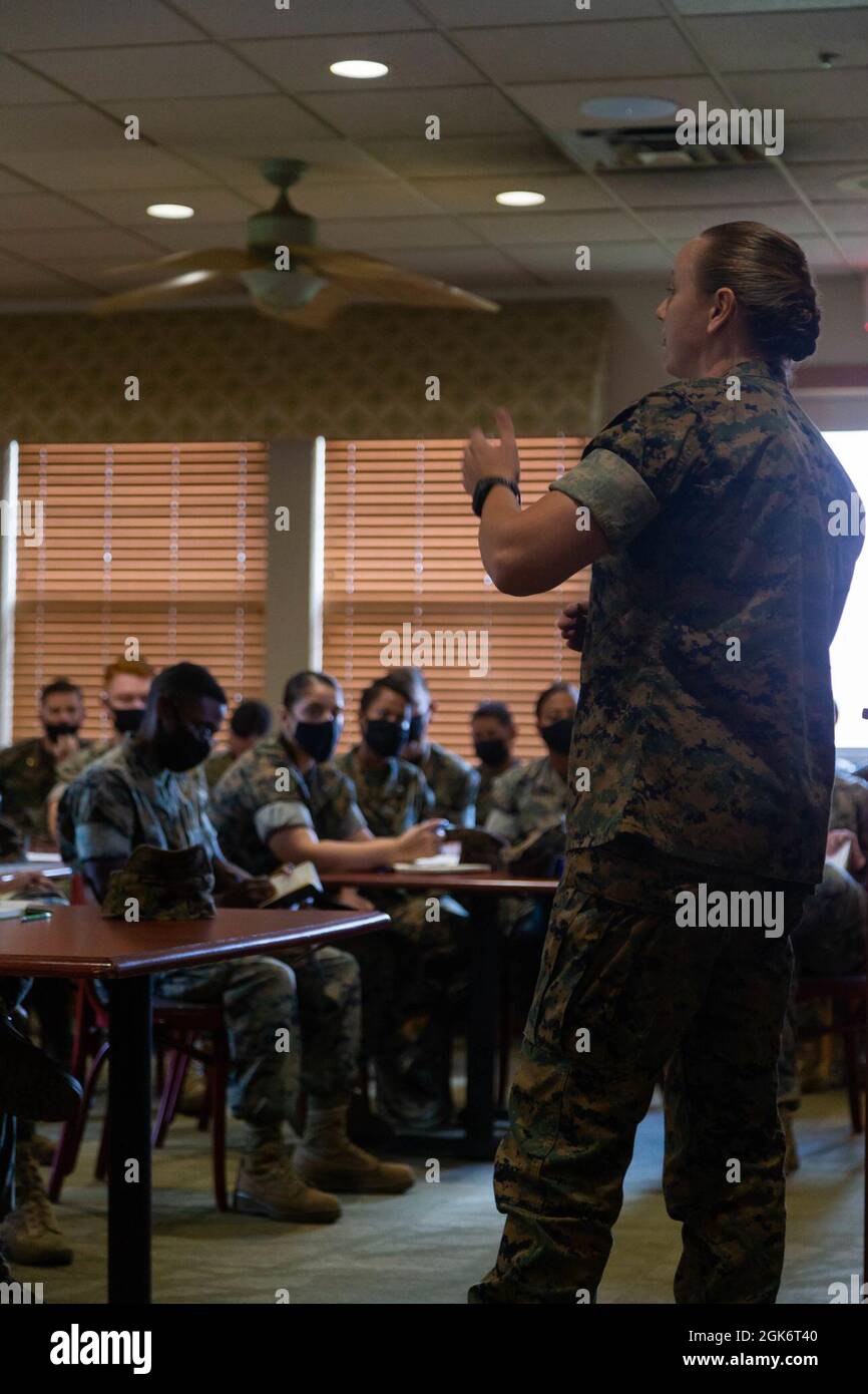 Capt. Emily Secrest, Company Grade monitor, speaks to officers at the ...