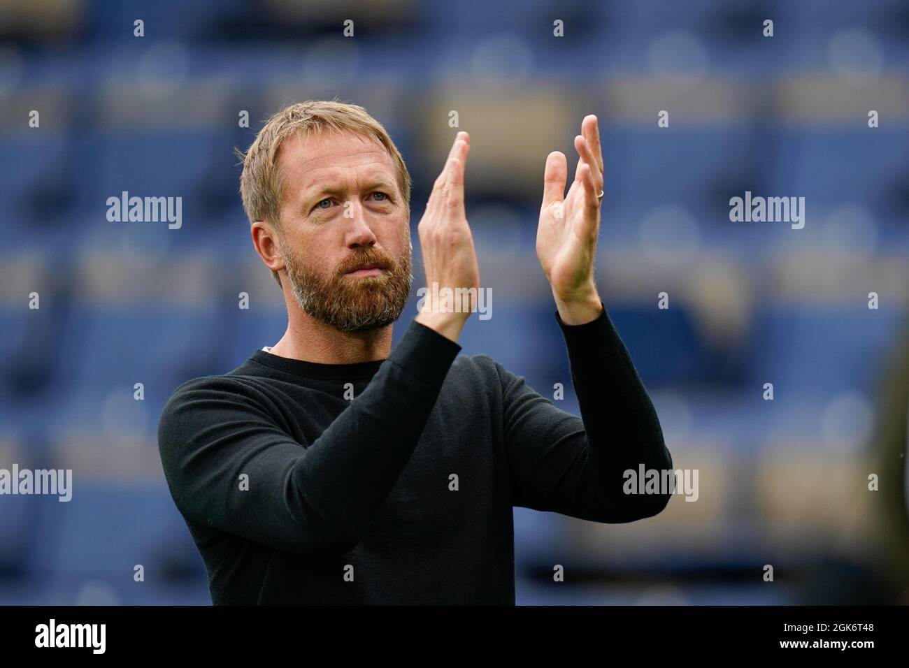 Brighton manager Graham Potter salutes the crowd after the final ...