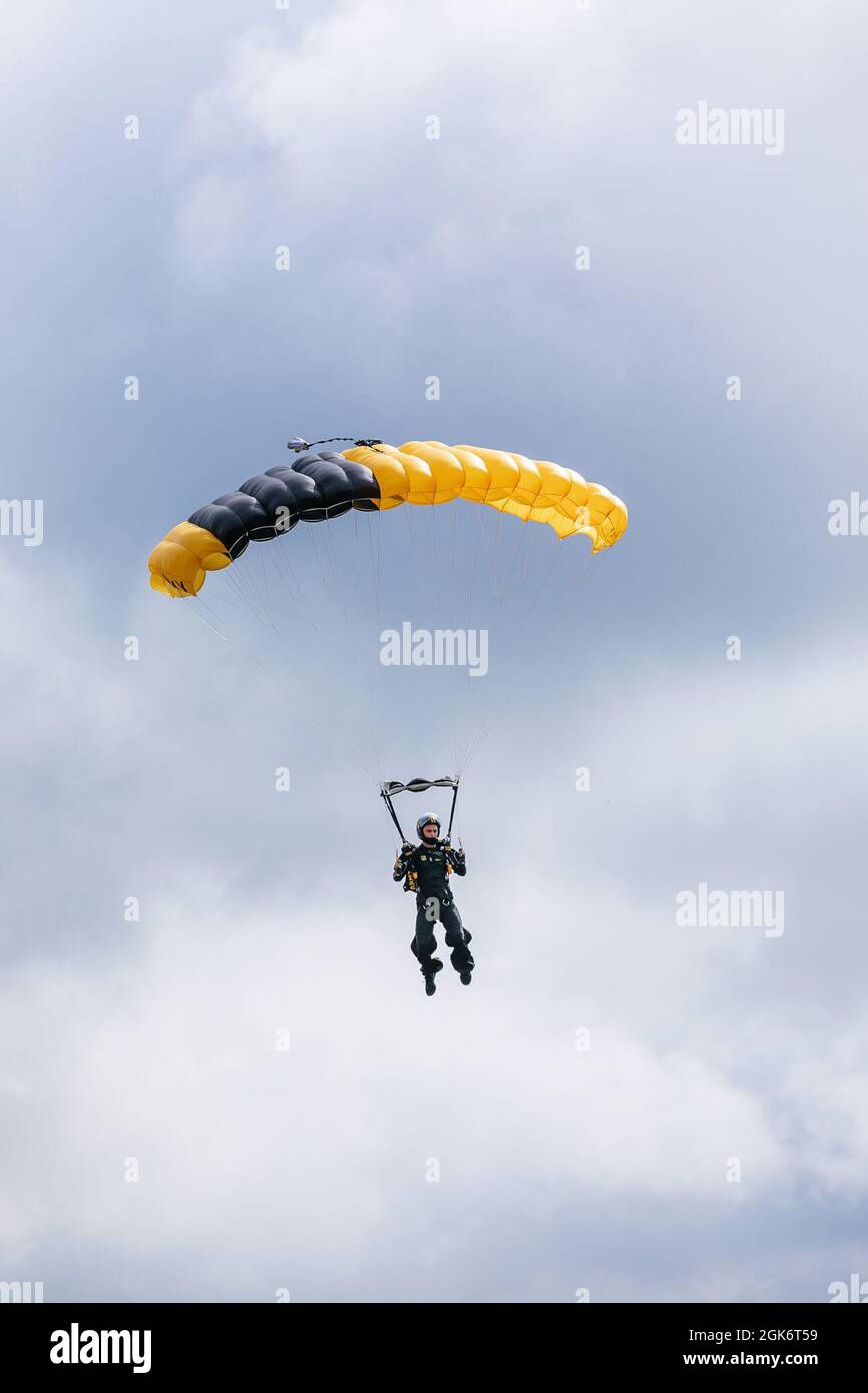 U.S. Army Staff Sgt. Mike Connors, U.S. Army Parachute Team, makes a ...