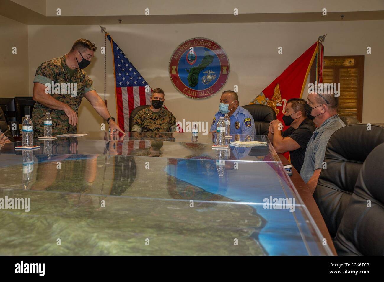 Lt. Col. Tate Buntz, the Marine Corps Base (MCB) Camp Blaz Operations Officer, briefs ...