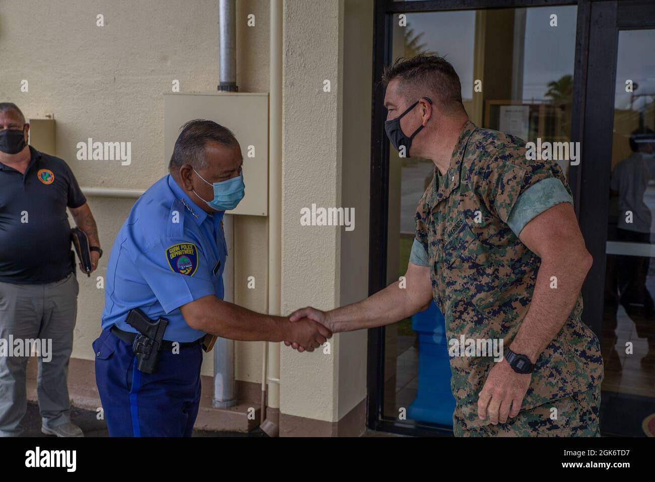 Lt. Col. Tate Buntz, the Marine Corps Base (MCB) Camp Blaz Operations Officer, greets Steve ...