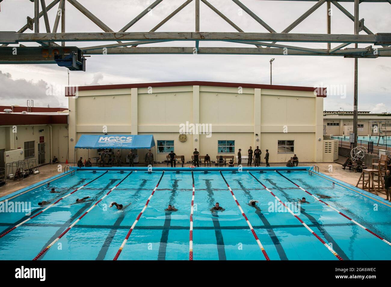 U.S. Marines with 9th Engineer Support Battalion conduct a 250-meter ...