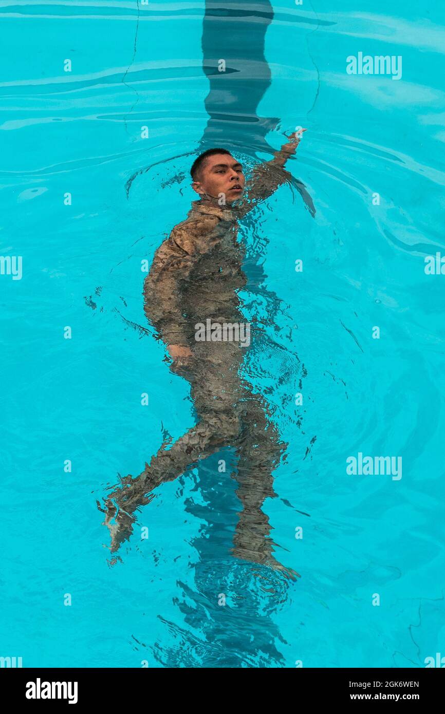 A U.S. Marine conducts a 250-meter swim during a Littoral Engineer ...