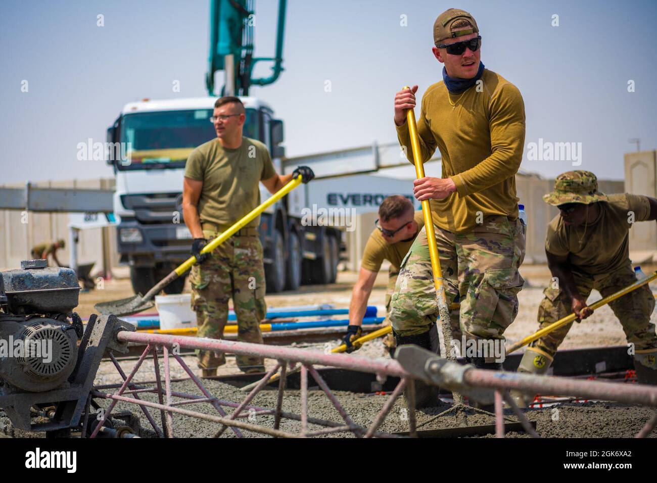 U.S. Airmen from the 1st Expeditionary Civil Engineer Group (ECEG) and ...