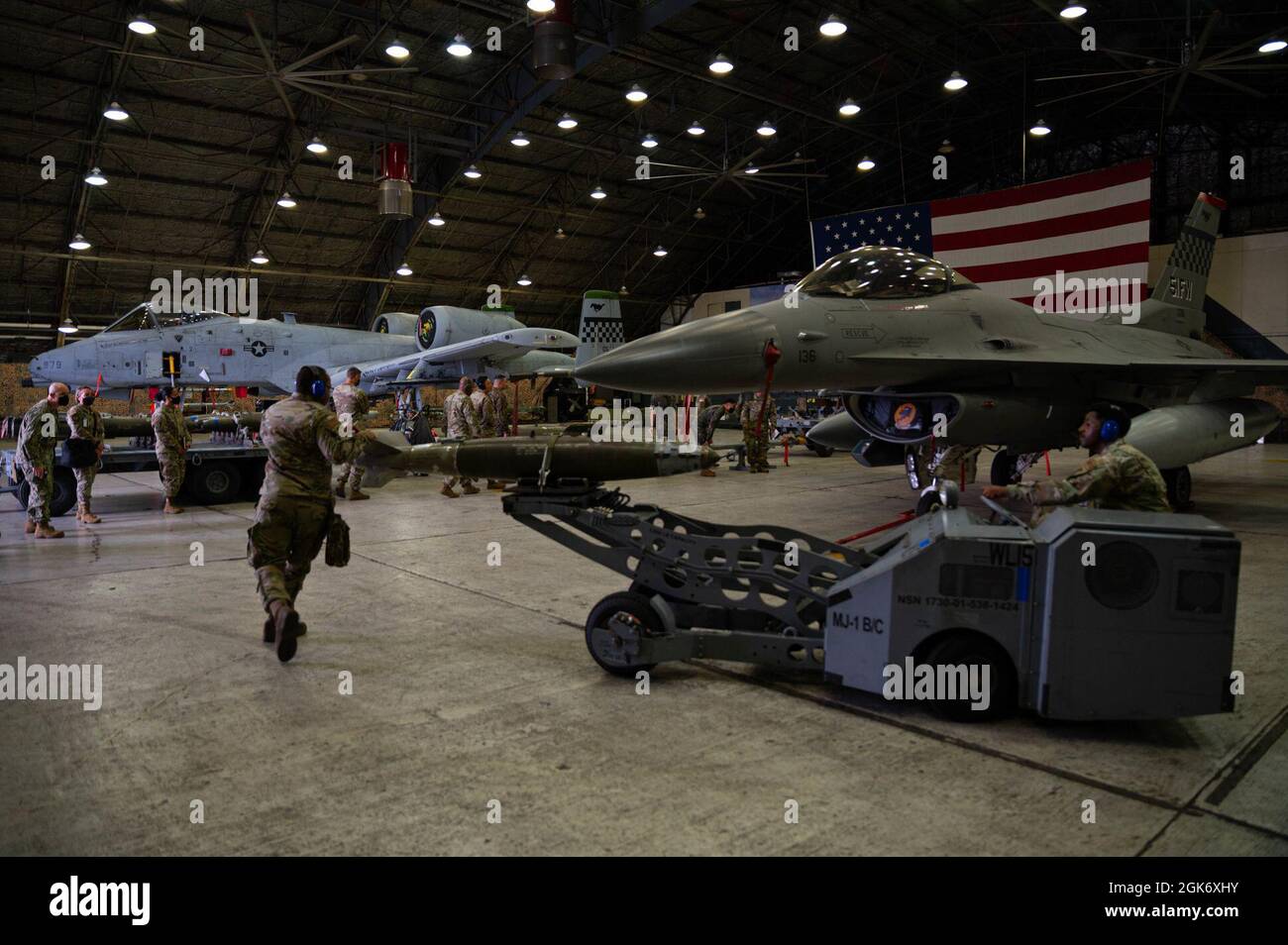 The 51st Aircraft Maintenance Squadron load munitions for the Command ...