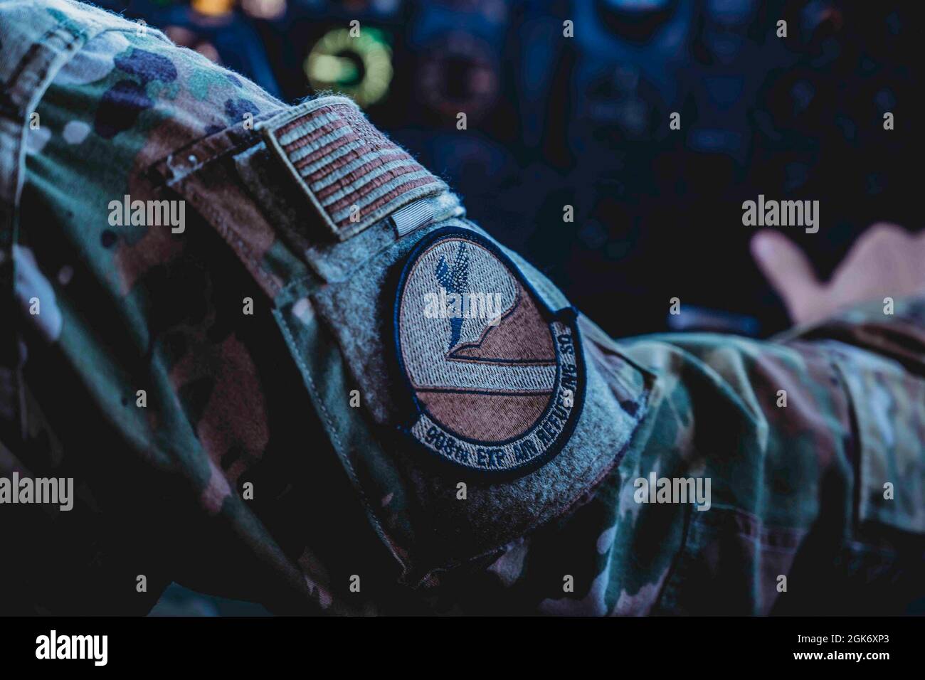 A patch from the 908th Expeditionary Air Refueling Squadron is shown ...