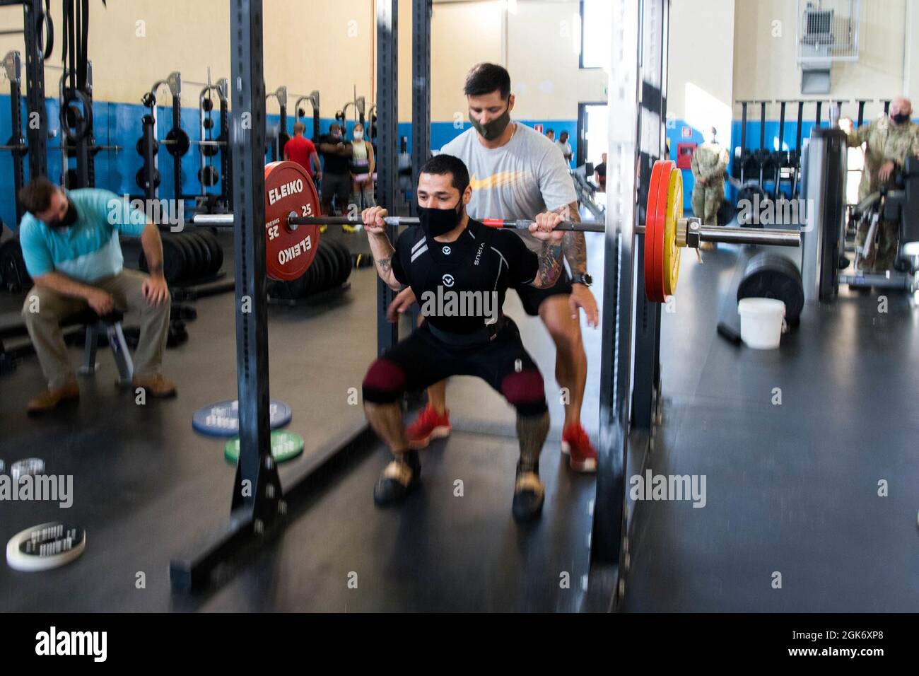 Aaron Acosta, power lifting competitor, performs a squat at Aviano Air ...