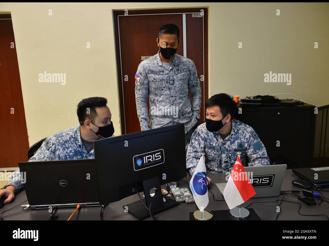 SINGAPORE (Aug. 18, 2021) – Philippines Navy officer (center) and ...