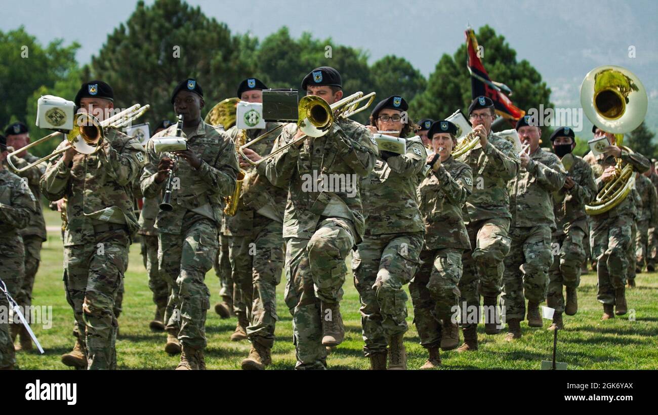 The 4th Infantry Division and Fort Carson Band participate in the ...