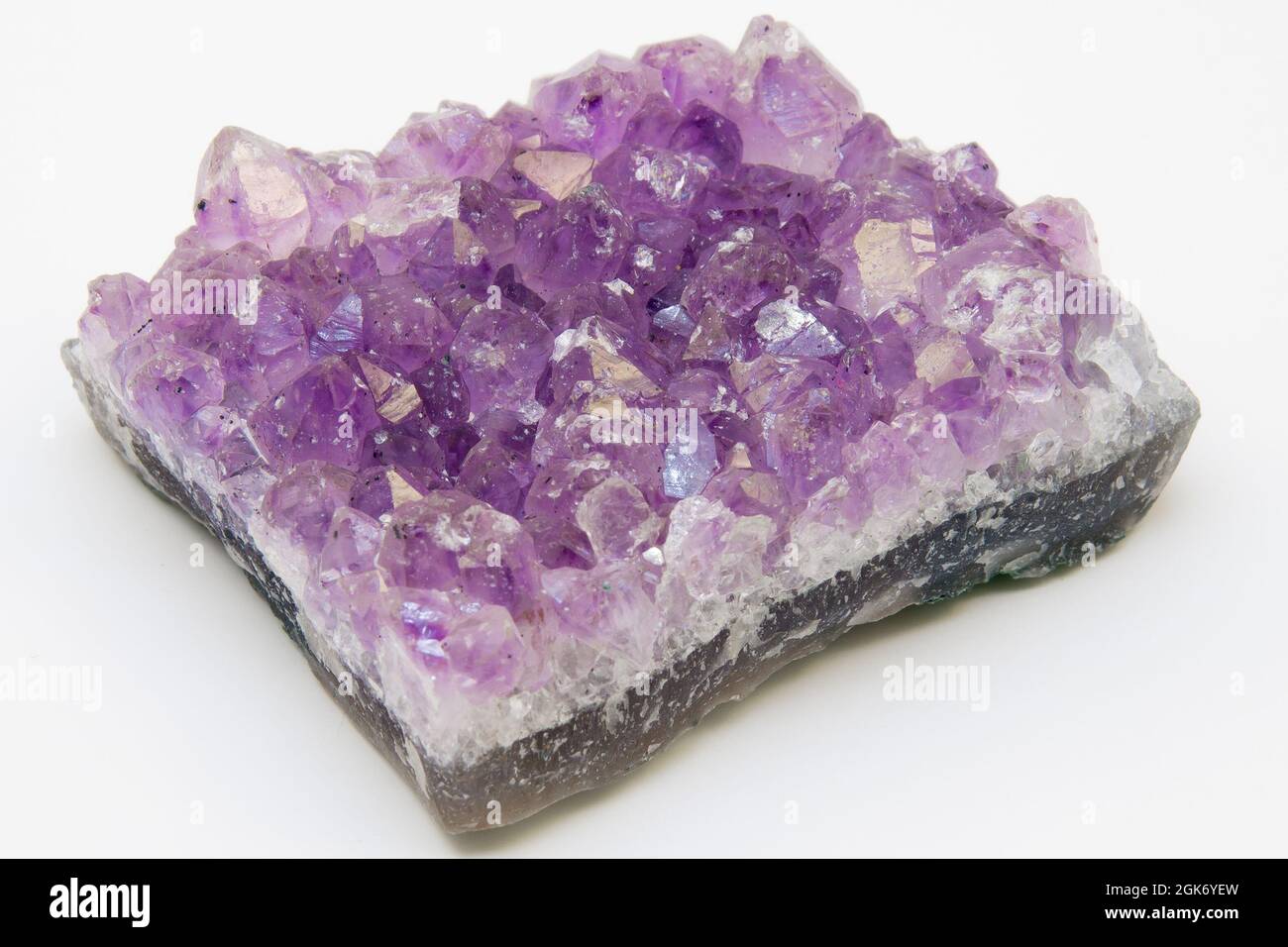 Amethyst Rock Crystal on a white background Stock Photo - Alamy