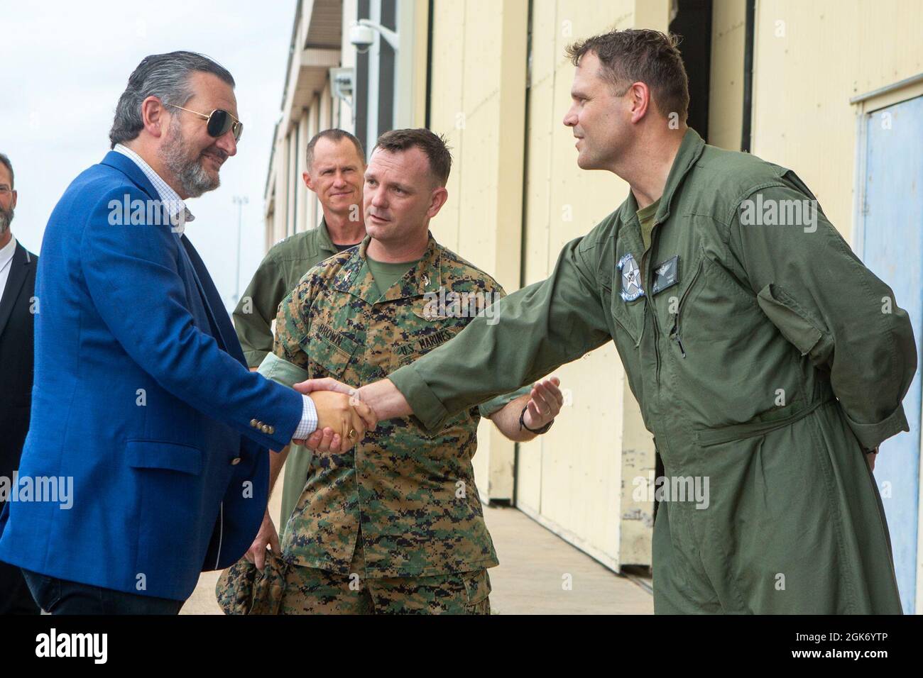 Texas Senator Ted Cruz is greeted by Lt. Col. Jeremy Yauck, commanding ...